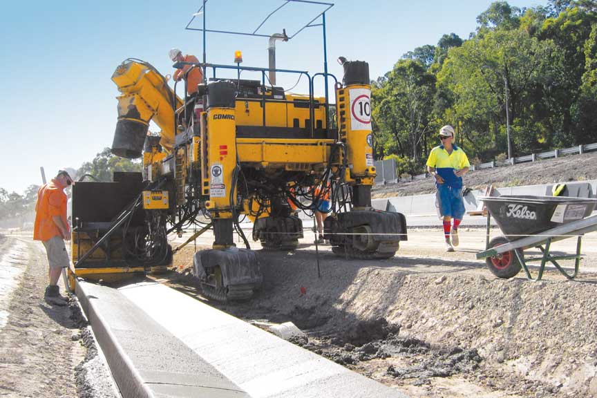 GOMACO, Manufacturer of Concrete Slipform Paving Equipment: Four-Track ...