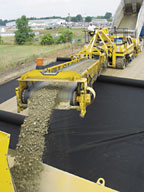 GOMACO, Manufacturer of Concrete Slipform Paving Equipment: Rock Hopper ...